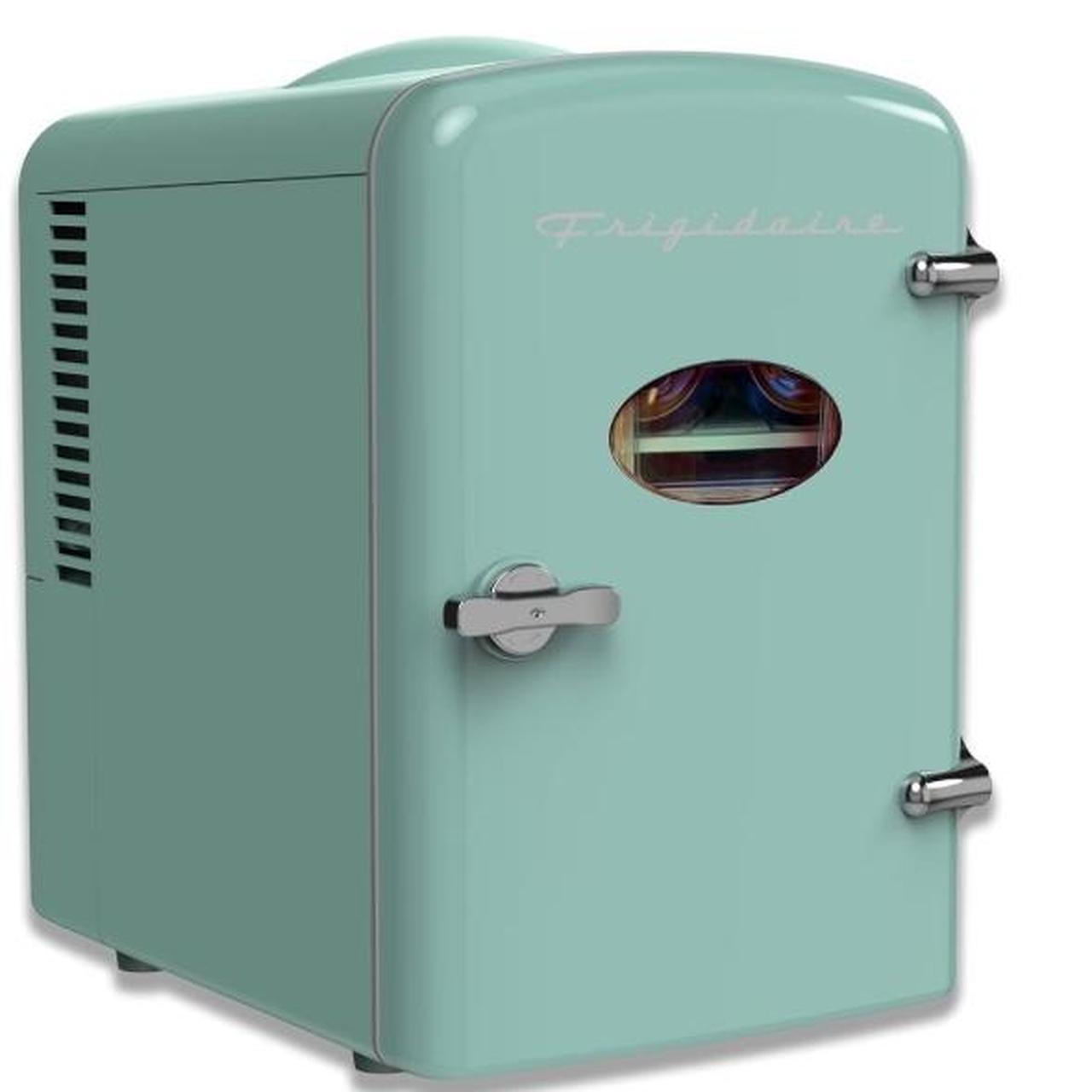 Frigidaire teal mini fridge, barely used. Selling it... - Depop
