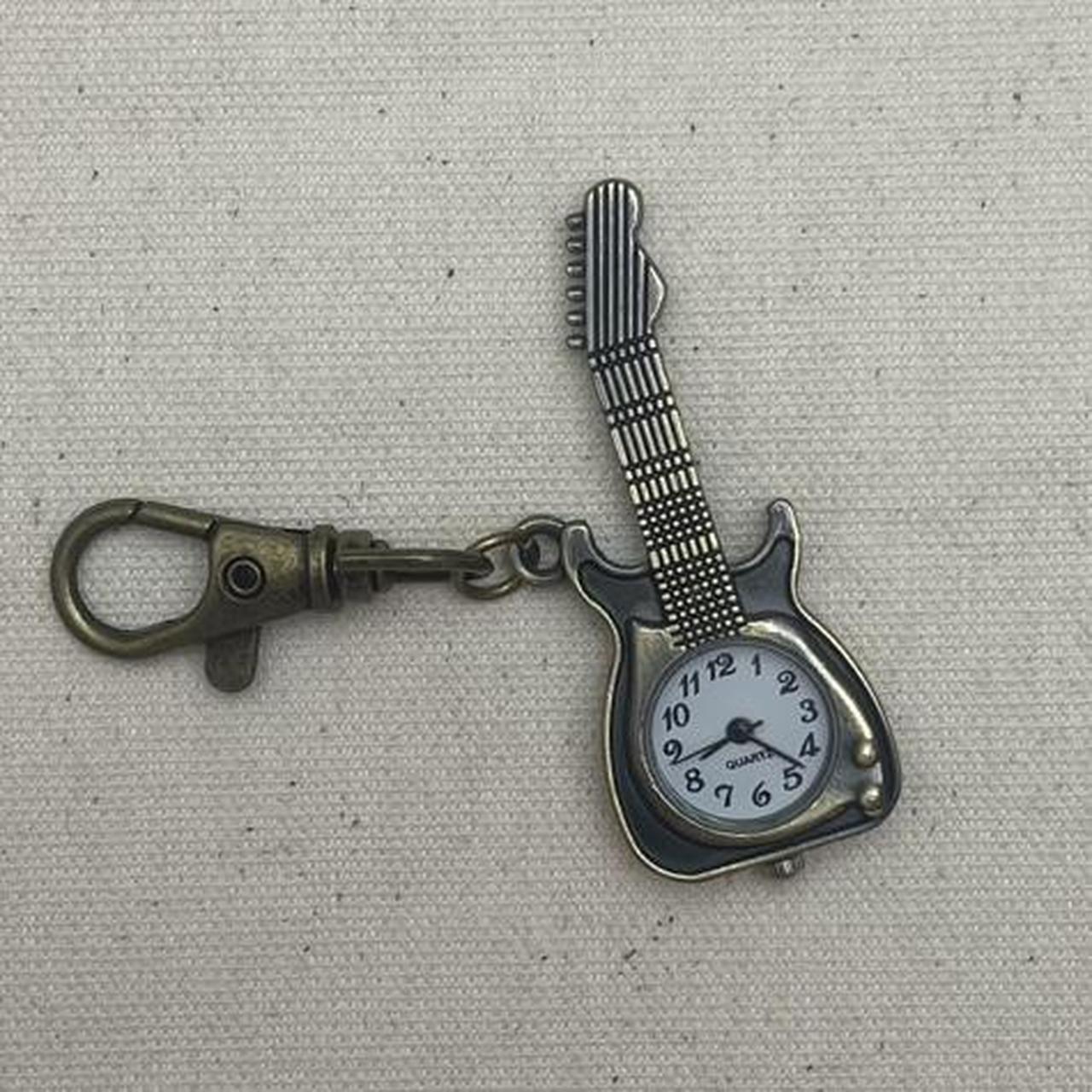Y2k 2000s style brass guitar clock keychain Vintage... | Depop
