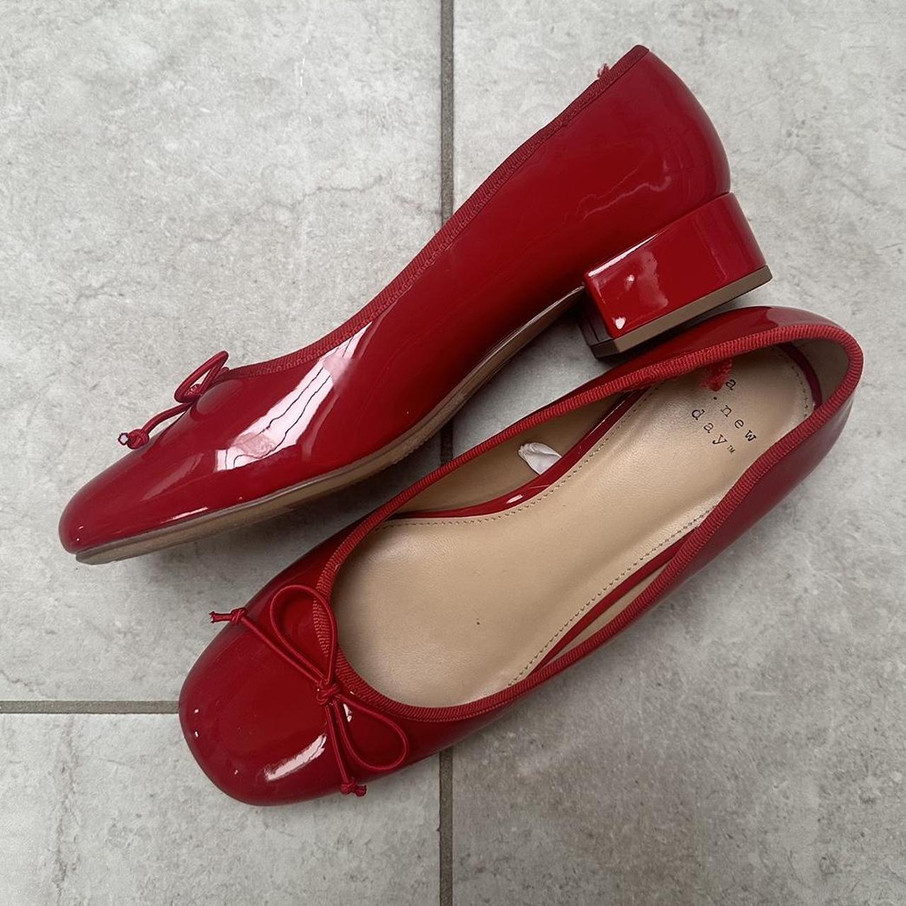 Red patent leather ballet flats with bow detail... - Depop
