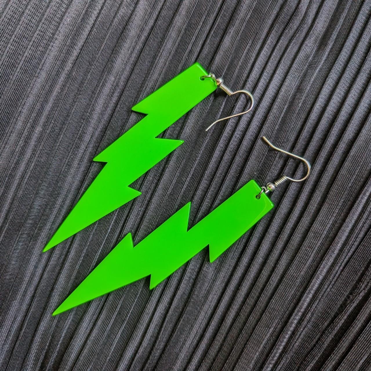 Neon green lightning bolt earrings, worn once for a... - Depop