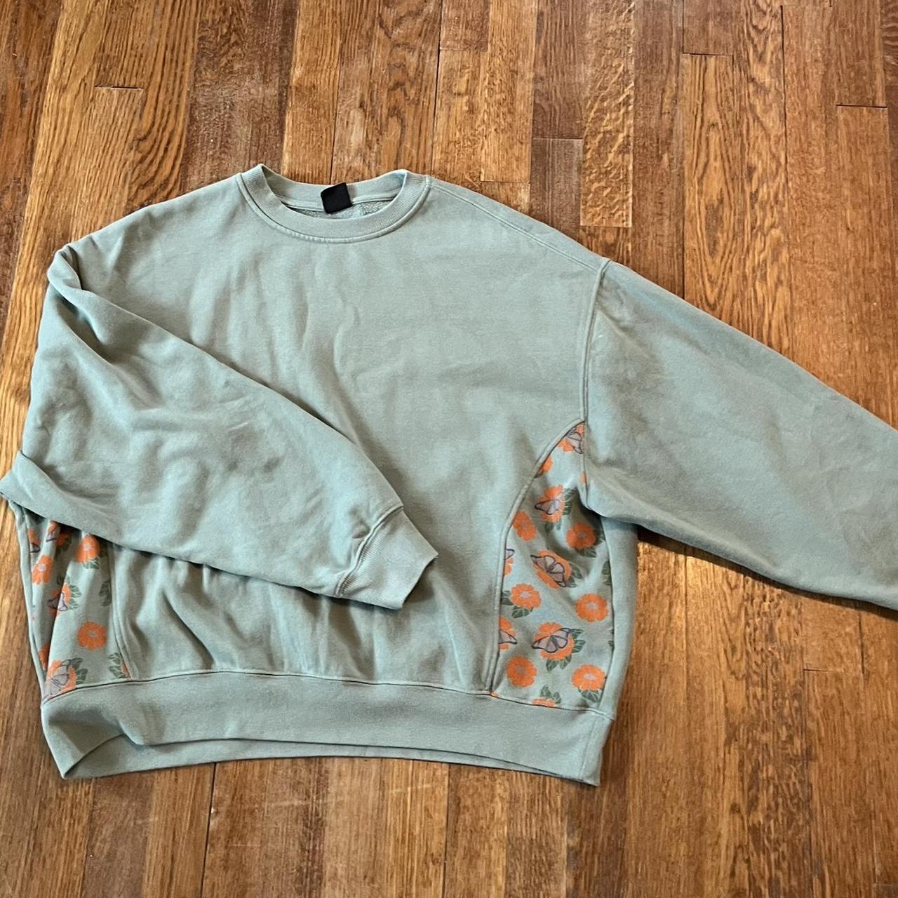 Pacsun green crewneck with orange flower detail on... - Depop