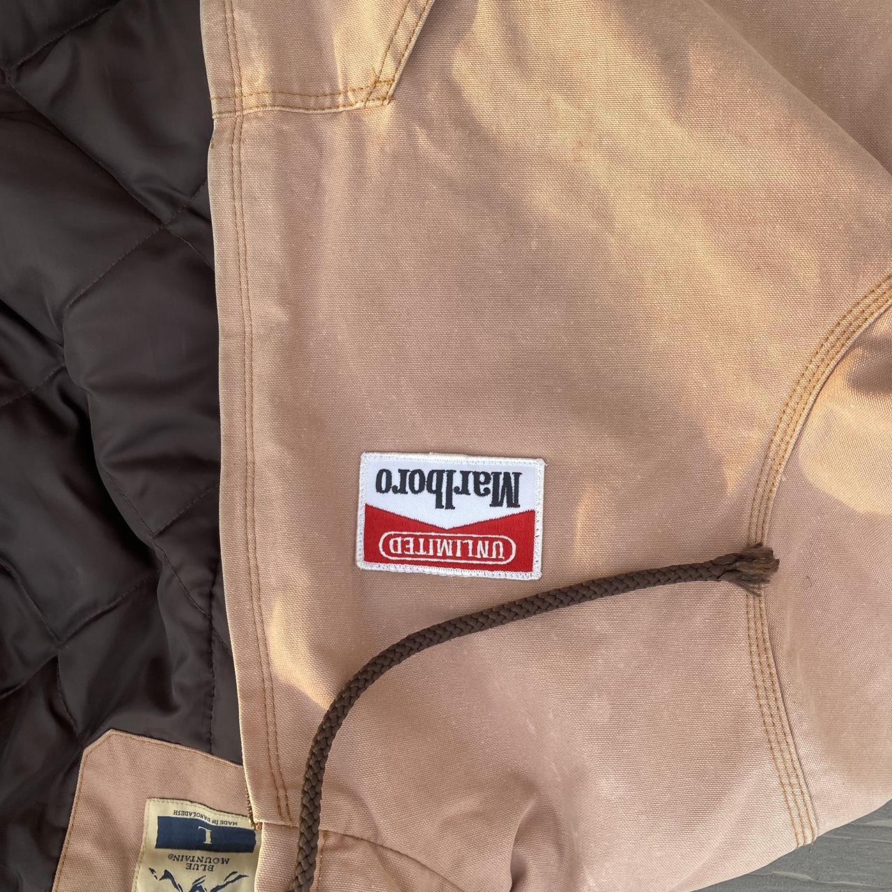 This Marlboro vintage brown jacket is a timeless... - Depop