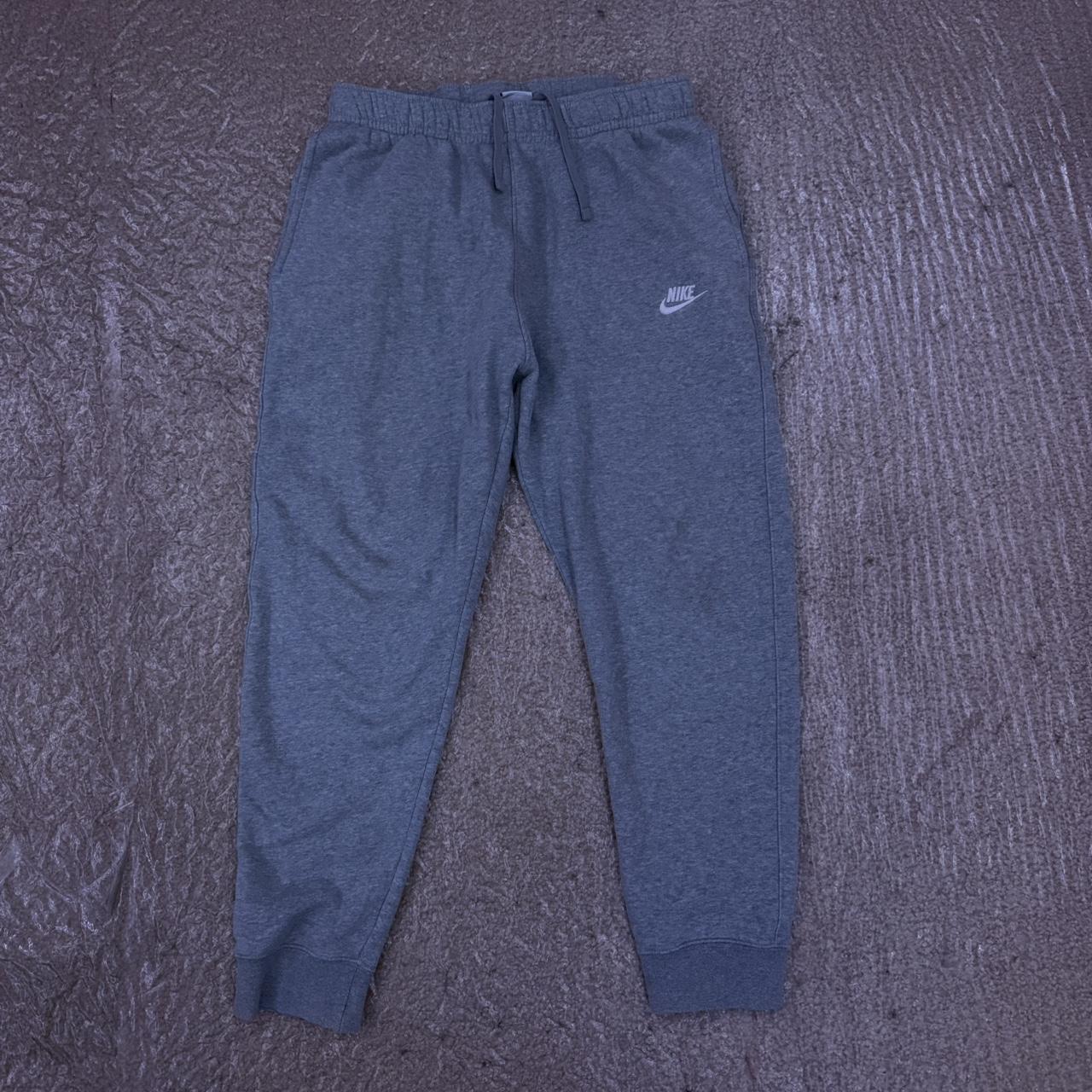 Grey Nike sweatpants with drawstring waist - Depop