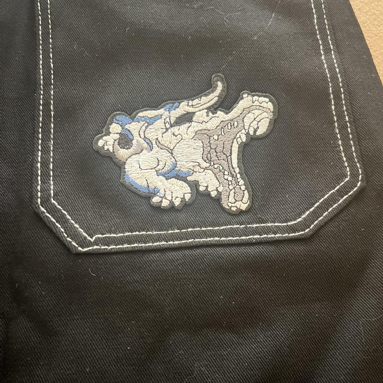 Black and white JNCO wide leg jeans with embroidered... - Depop