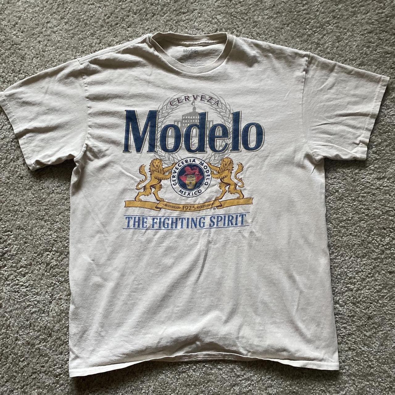 Modelo Fighting Spirit tee Size: Large #tshirt #modelo - Depop