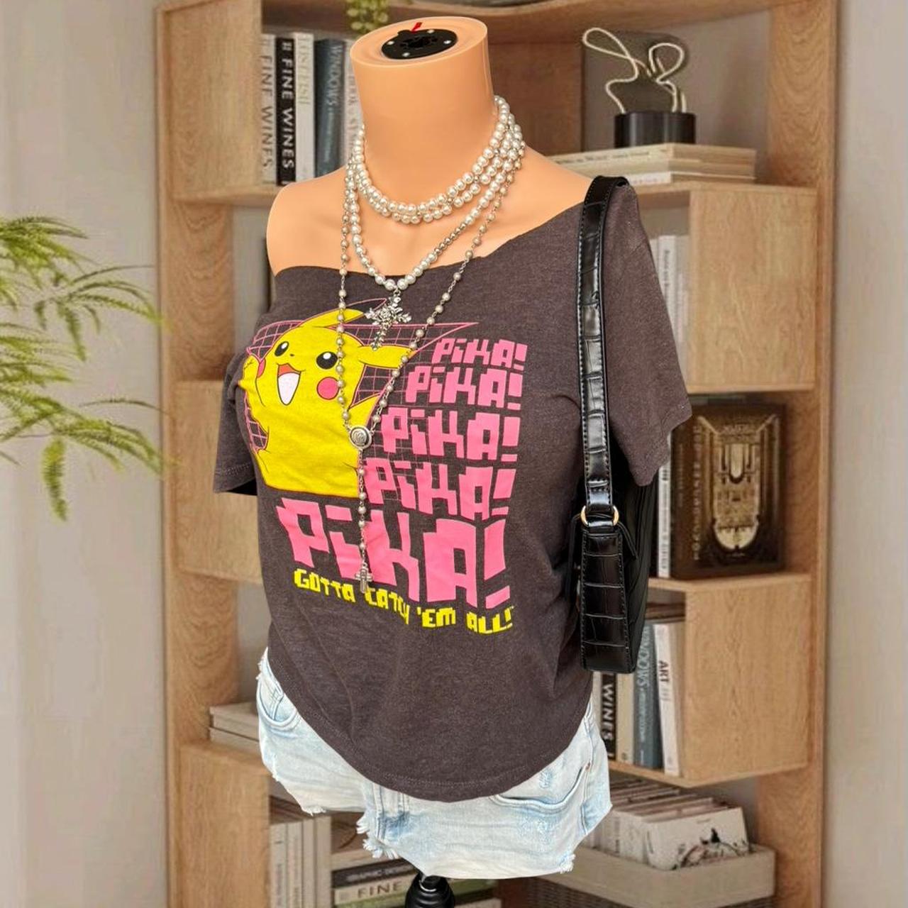 Brown Pikachu Off-the-Shoulder Graphic Tee... | Depop