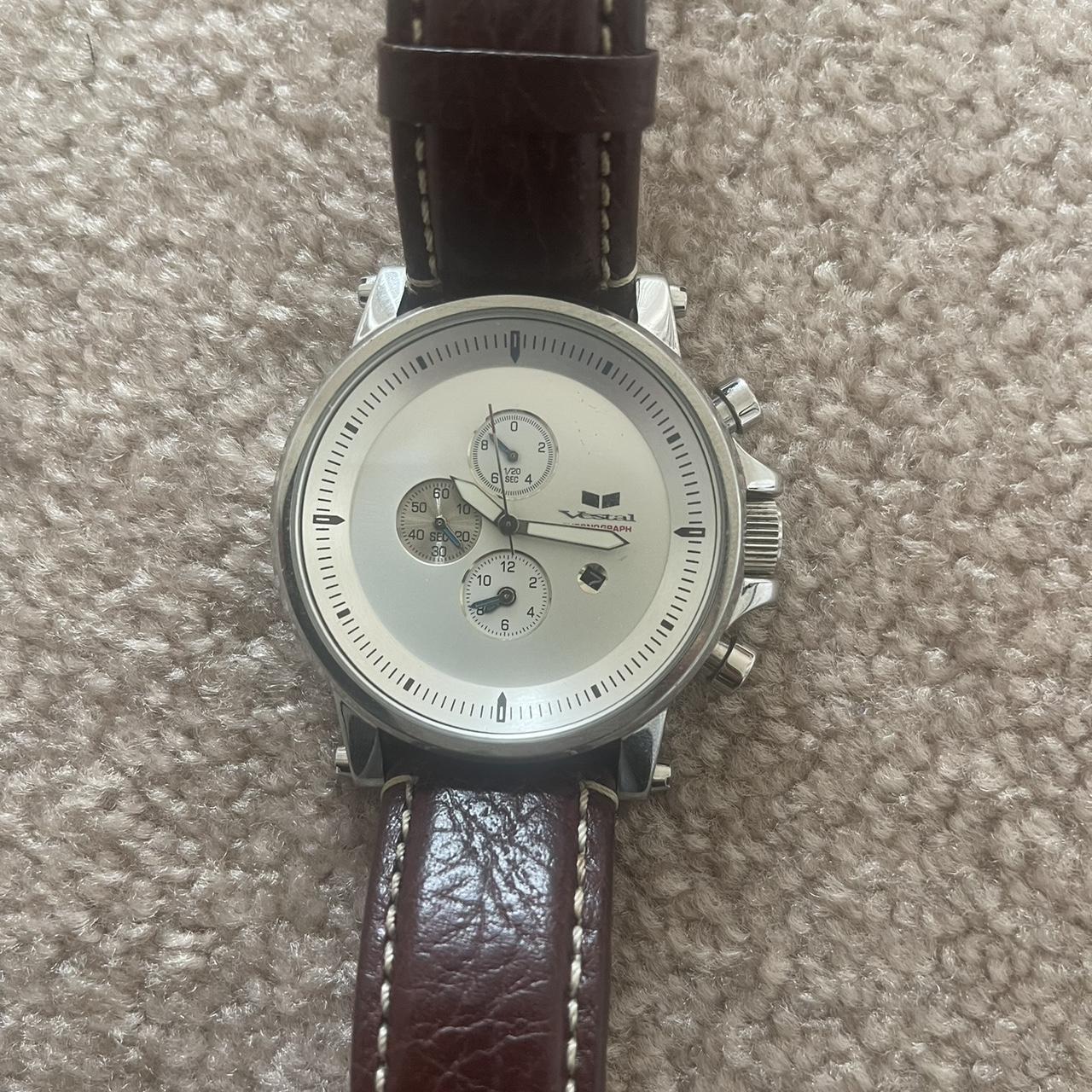 Silver and brown analogue watch with leather band... - Depop
