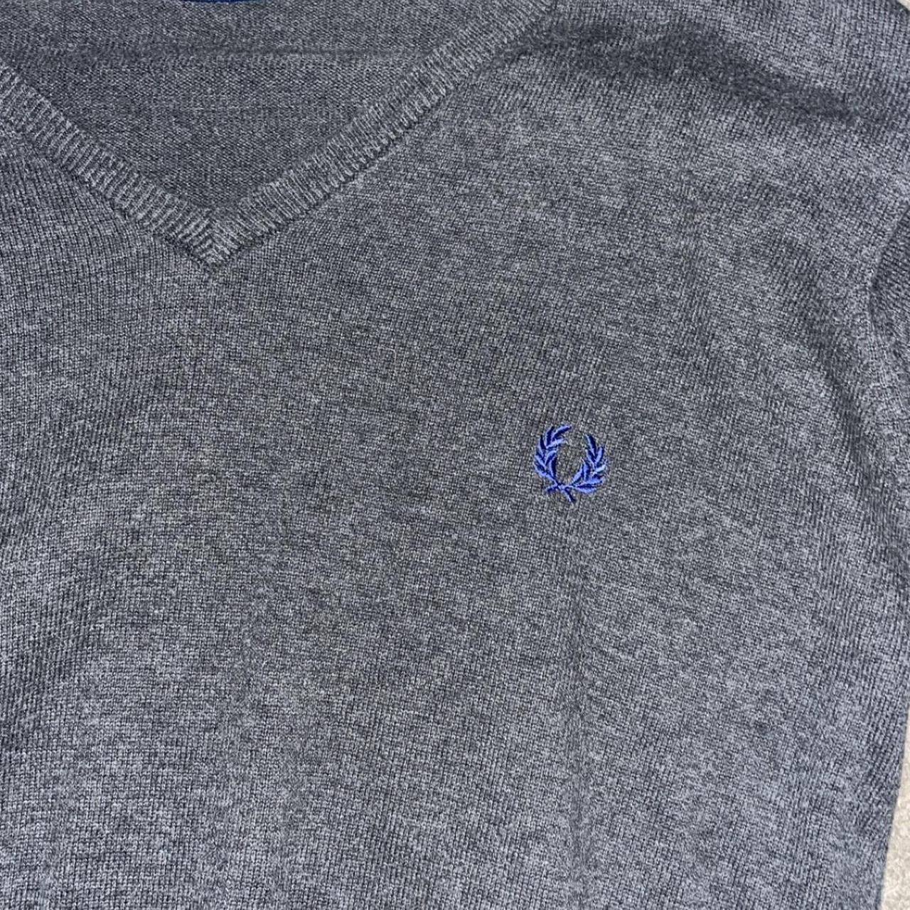 This grey Fred Perry V-neck jumper offers a perfect... - Depop
