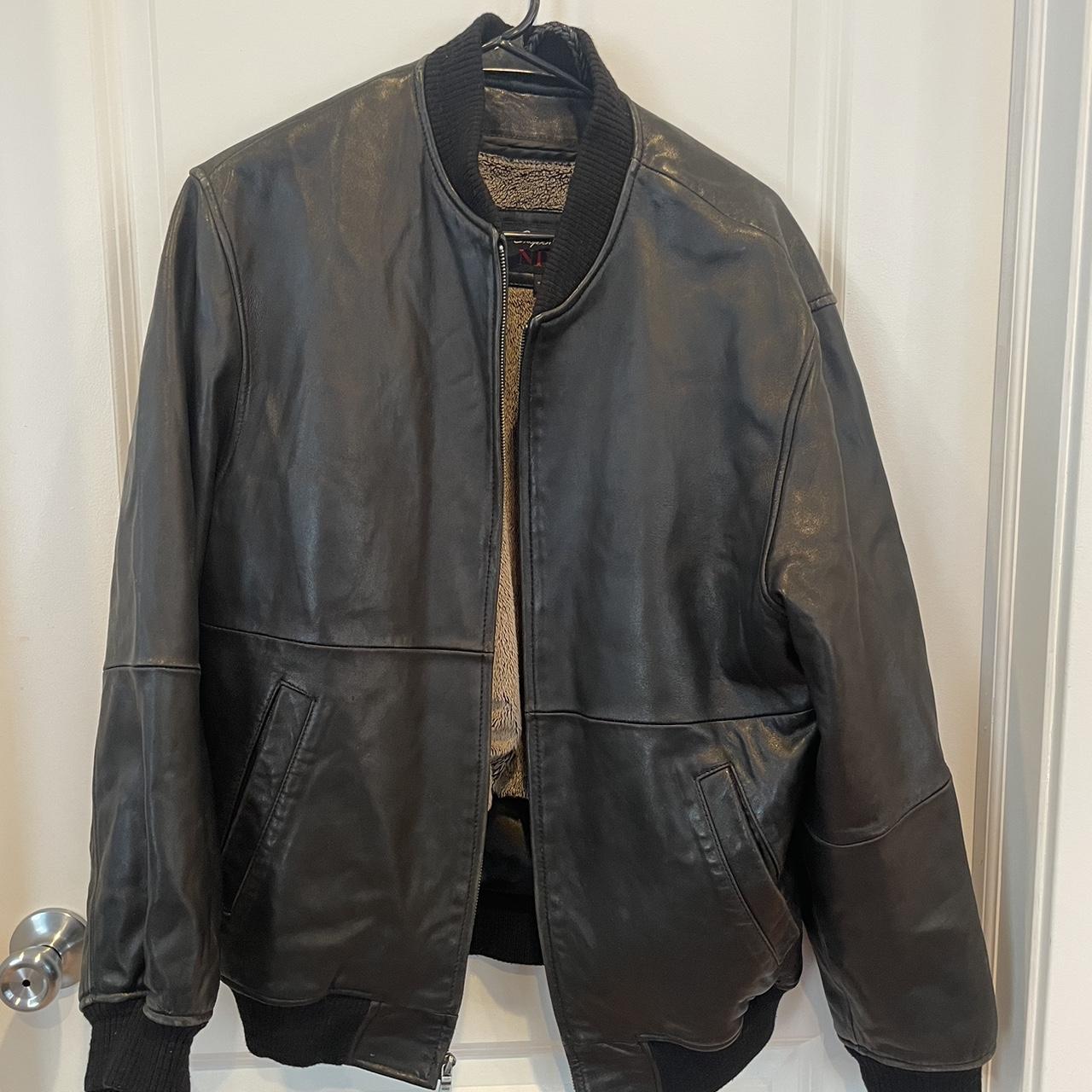 Black leather bomber jacket with a 90s vibe. Size... - Depop