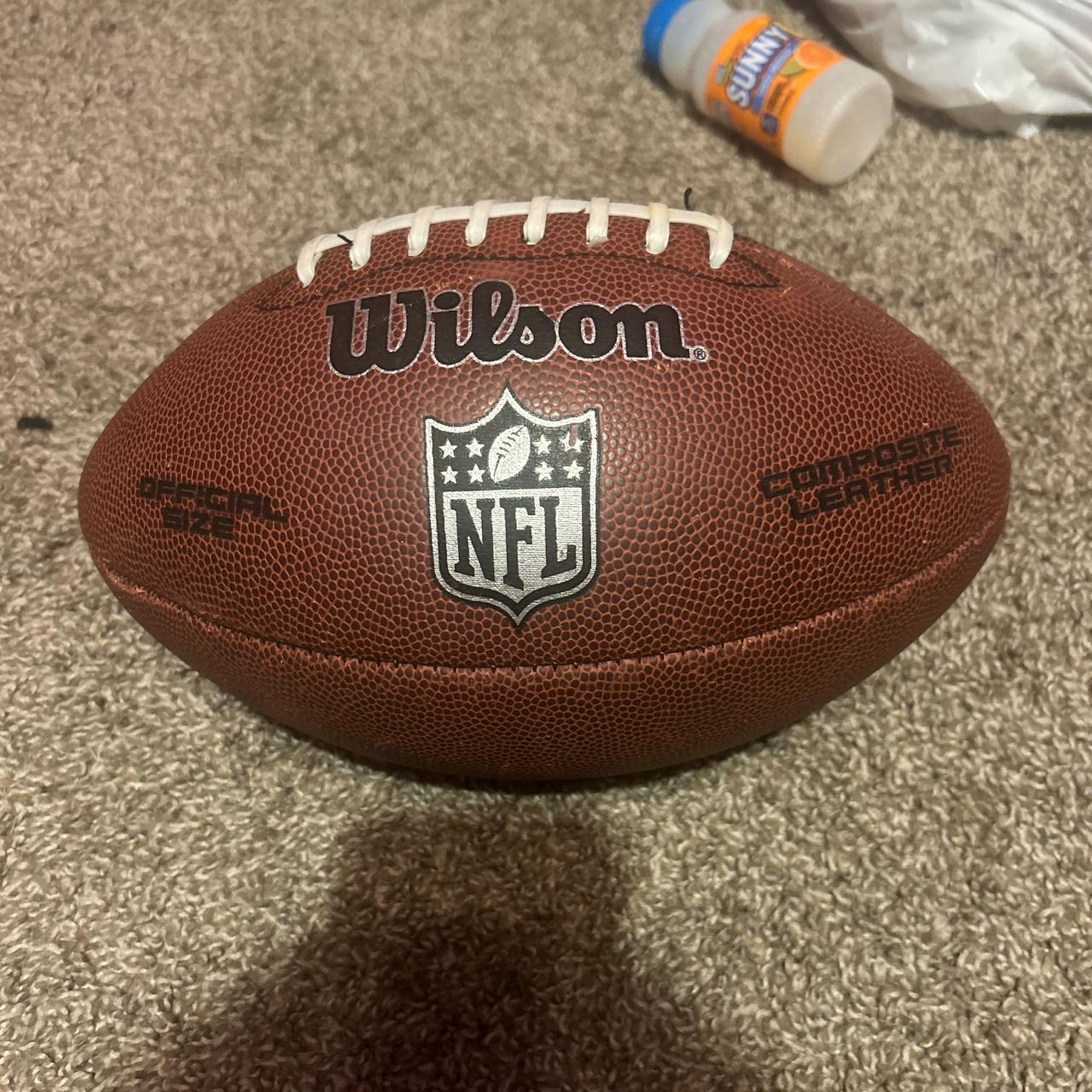 Brown and white Wilson NFL composite leather... - Depop