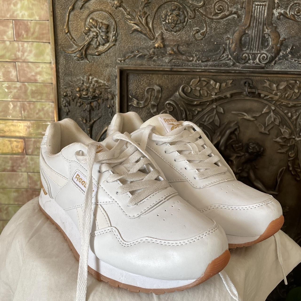 White Reebok trainers with slight wear on the soles,... | Depop