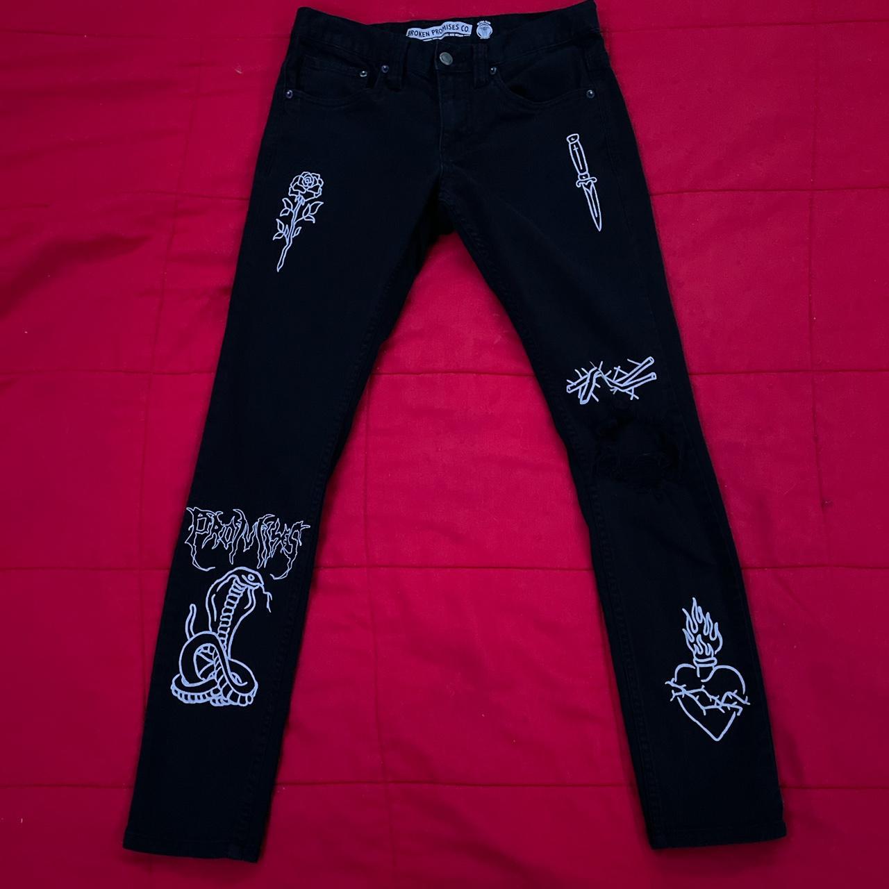 Black Broken Promises skinny jeans with painted... | Depop