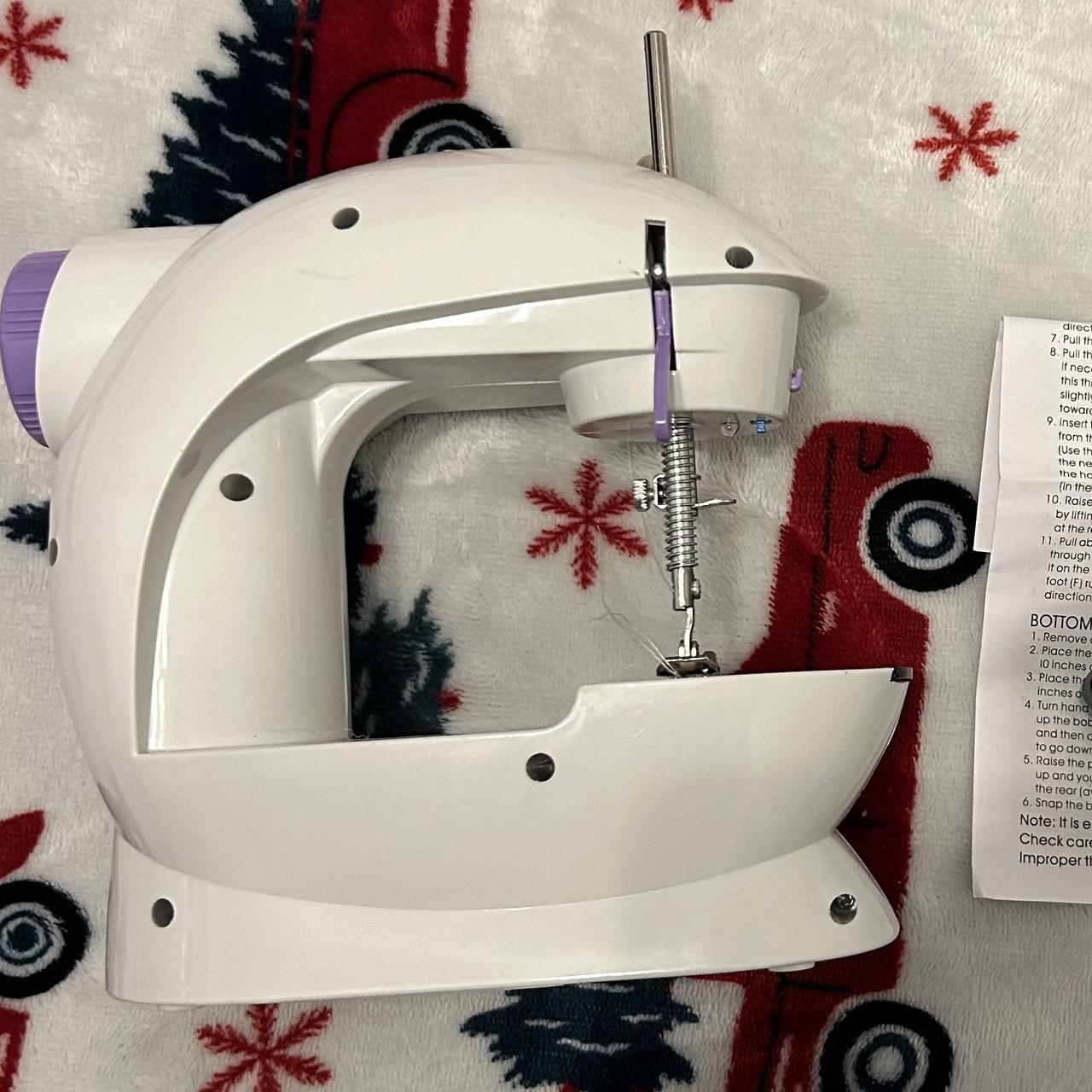 Small white and purple sewing machine - Depop