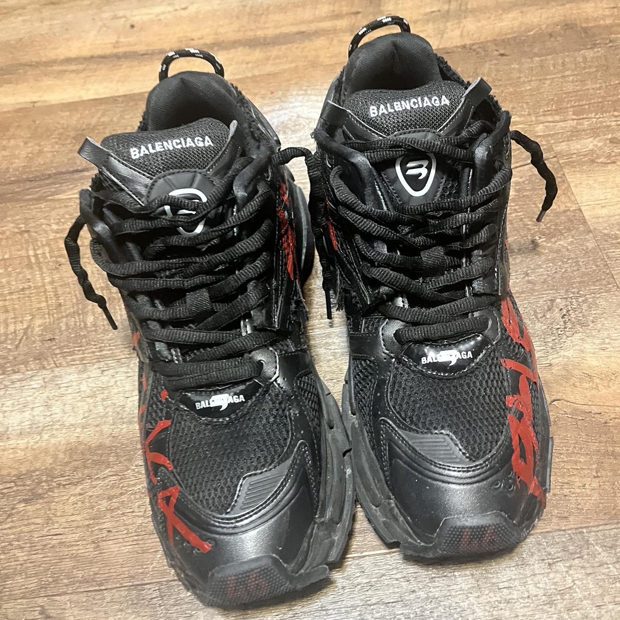Balenciaga runnrs black and red color way used good... - Depop