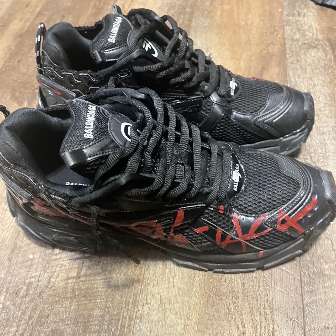 Balenciaga runnrs black and red color way used good... - Depop