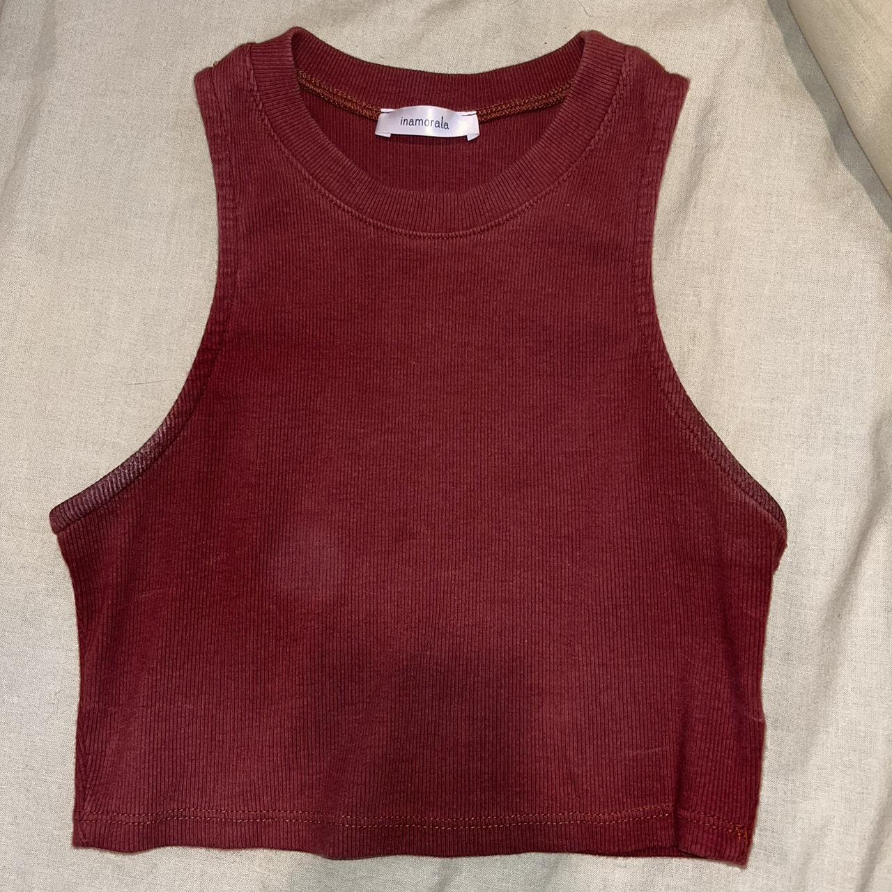 Cropped rusty red ribbed top. Hugs the body... - Depop