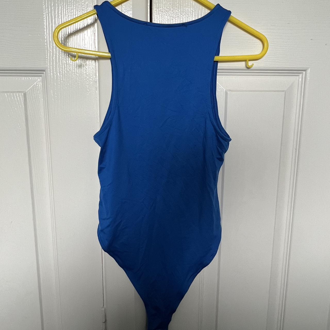 Blue body suit. Never worn. Will fit a size 2-4.... - Depop