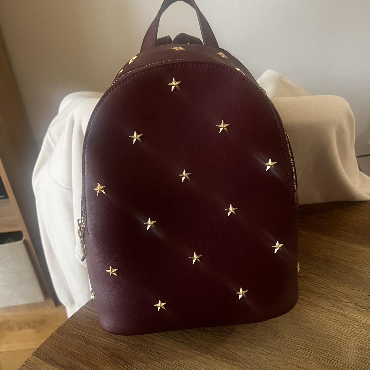Leather look burgundy backpack with gold hardware... - Depop