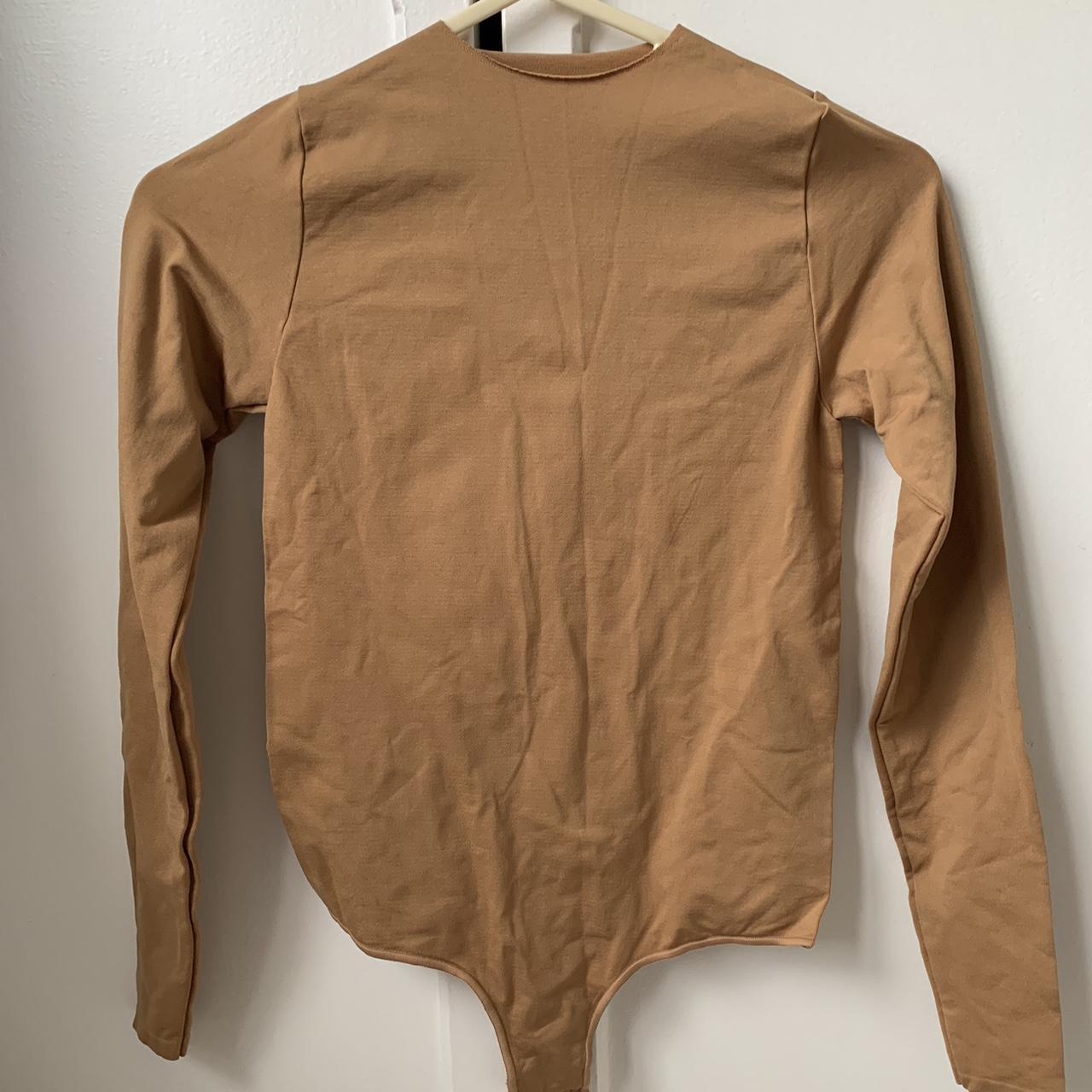 SKIMS tan, long sleeve bodysuit. Crew neck. New... - Depop