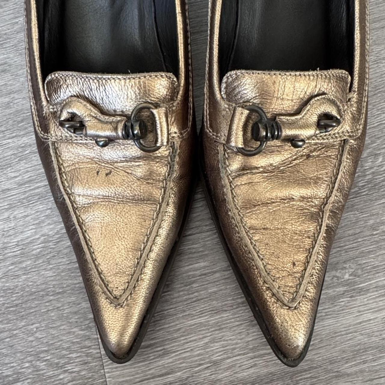 Fun pointed toe metallic gold heel with hardware... | Depop