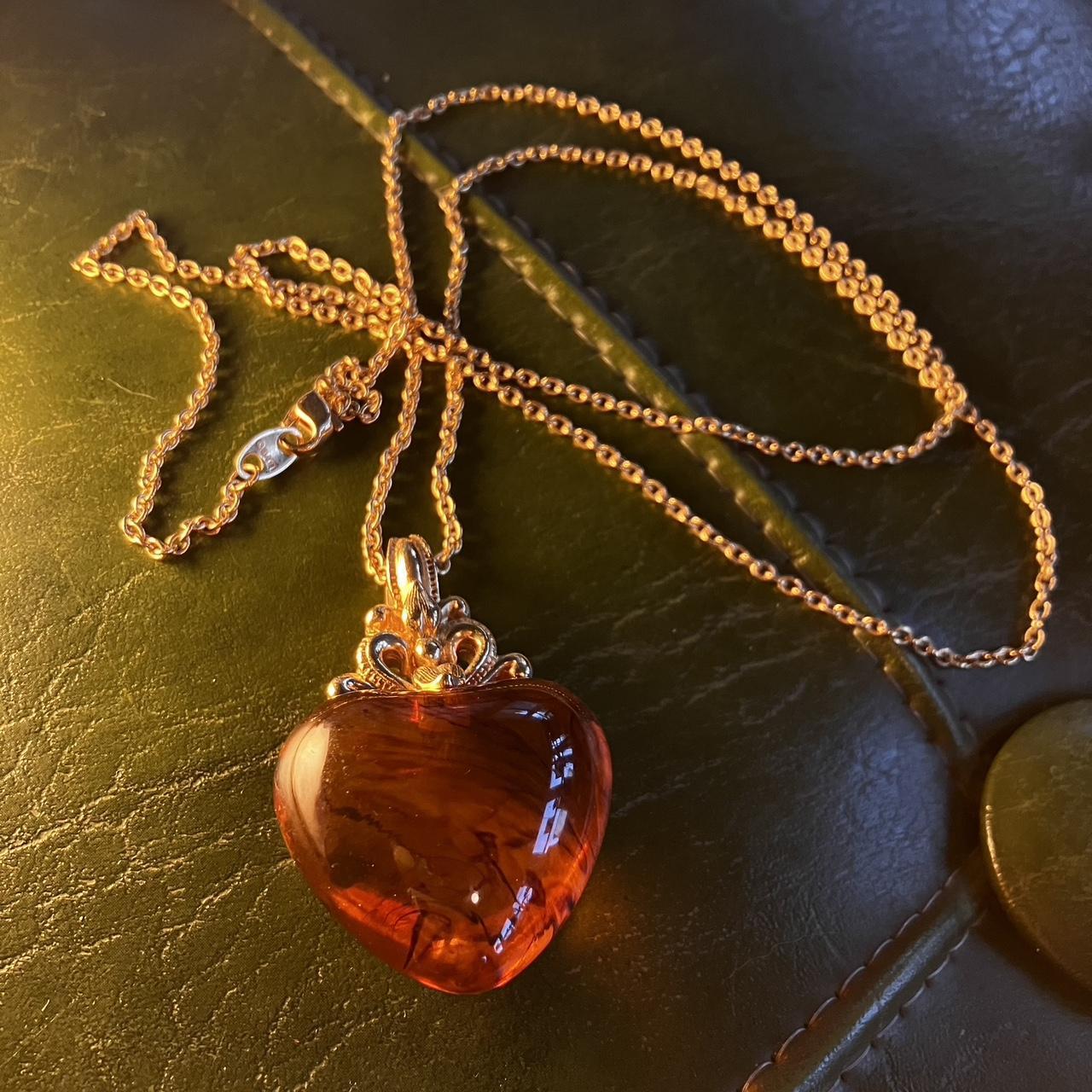 vtg avon faux amber heart & gold tone... - Depop