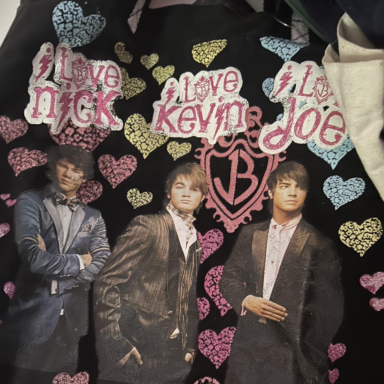jonas brothers tote bag has a zip up pocket on the... - Depop