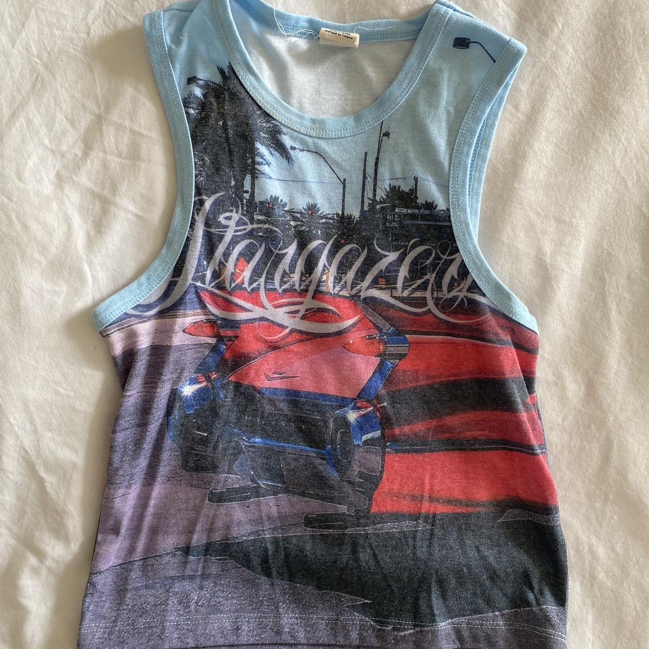 Urban outfitters photo racer tank top, size medium.... - Depop