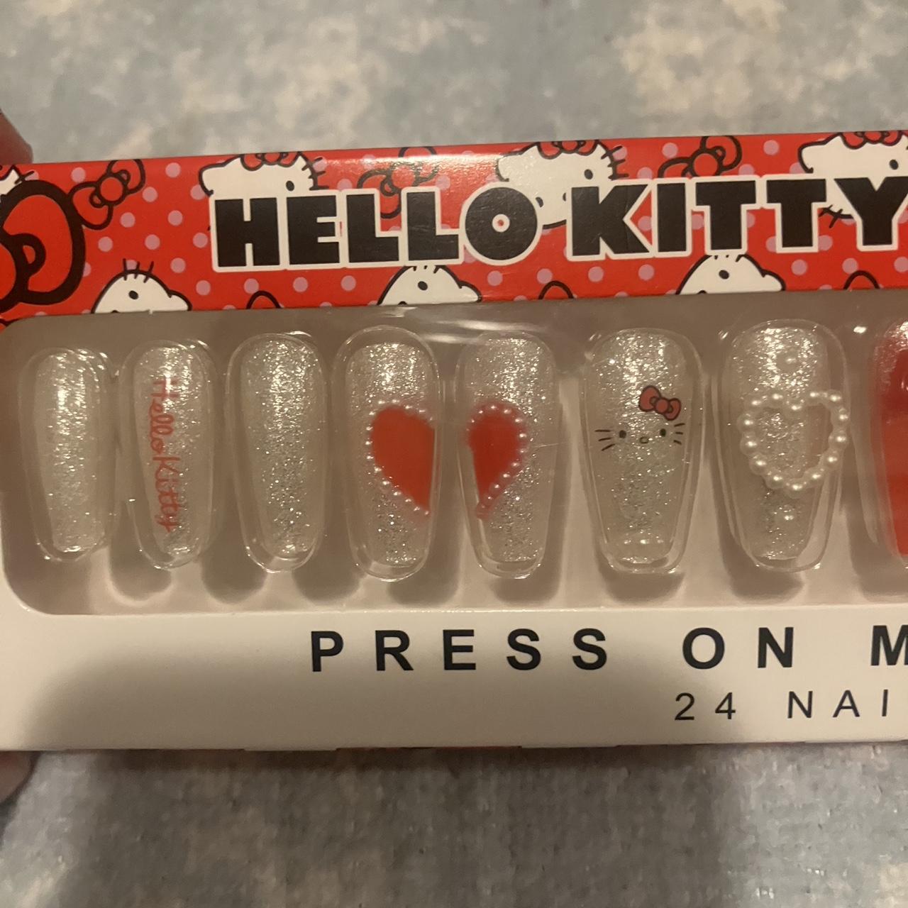 Hello Kitty red & white nail set. Brand new, retails... | Depop
