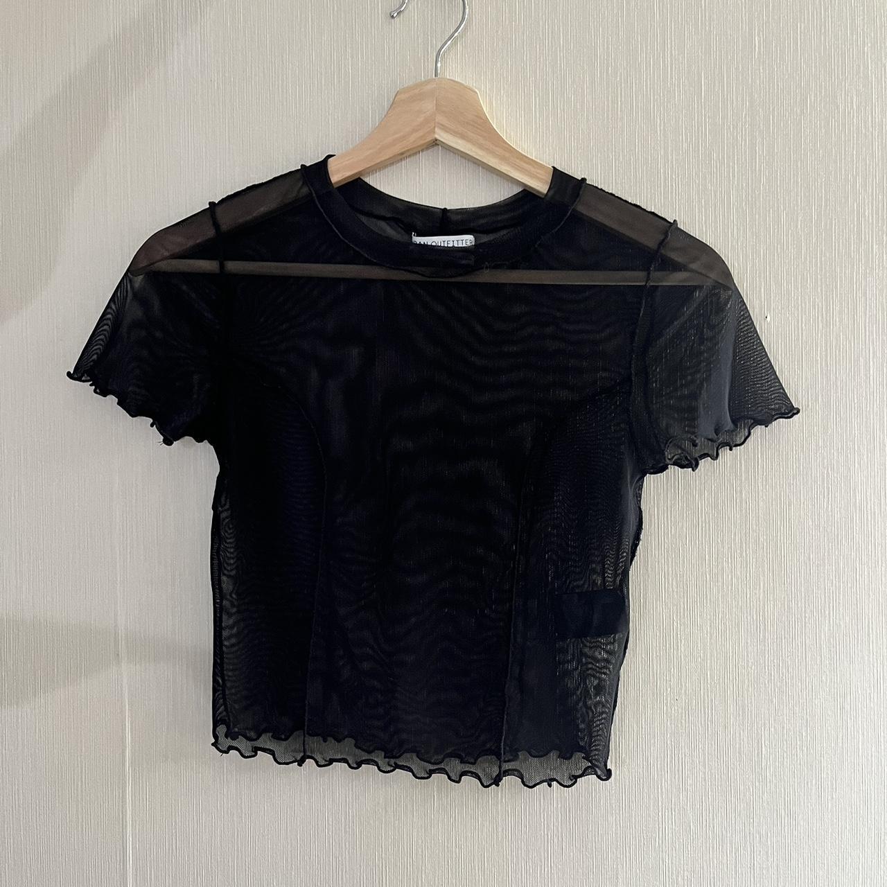 This is a simple black mesh top from urban... - Depop