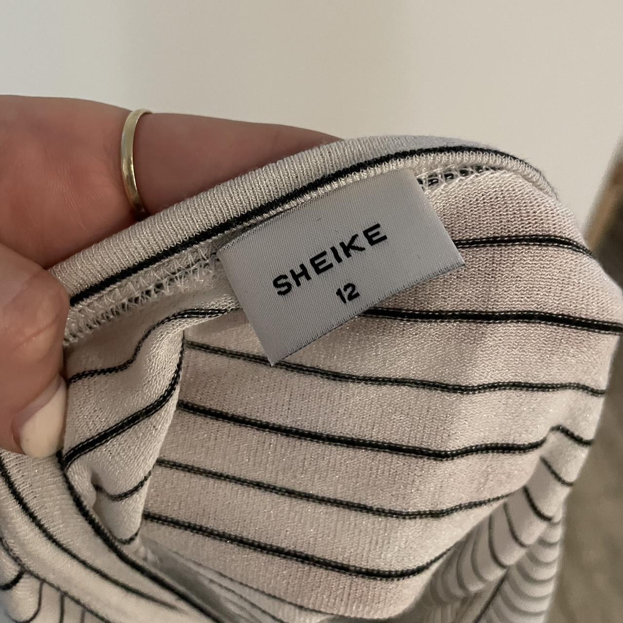 Stripe crop - Sheike Size 12 but I feel it’s closer... - Depop