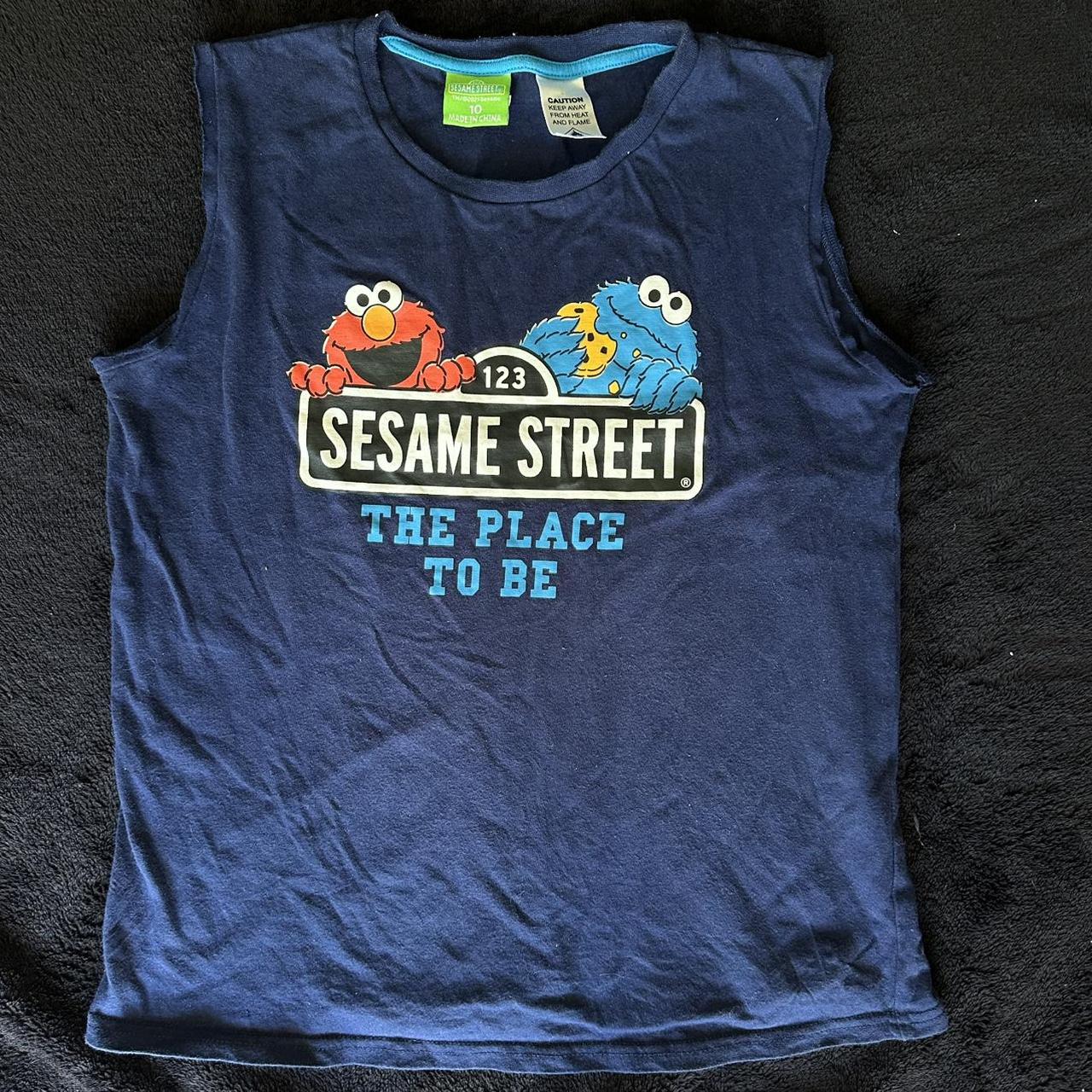 Blue Sesame Street sleeveless top. Kids size 10,... - Depop