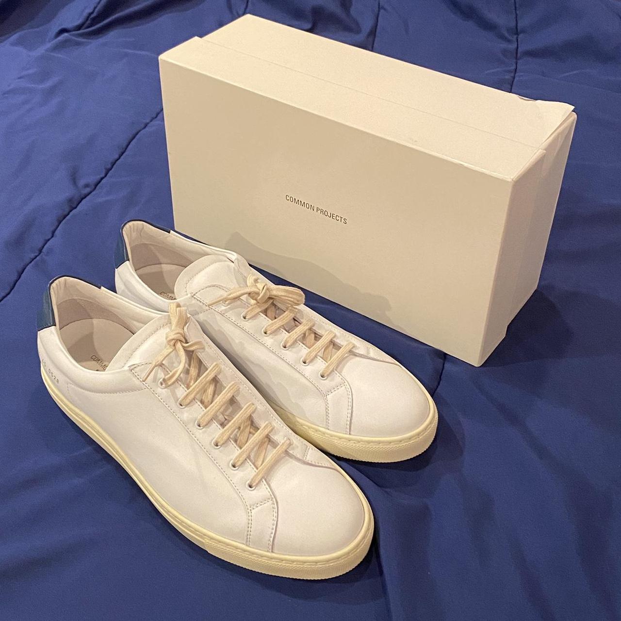 Common Projects Men's White and Navy Trainers | Depop