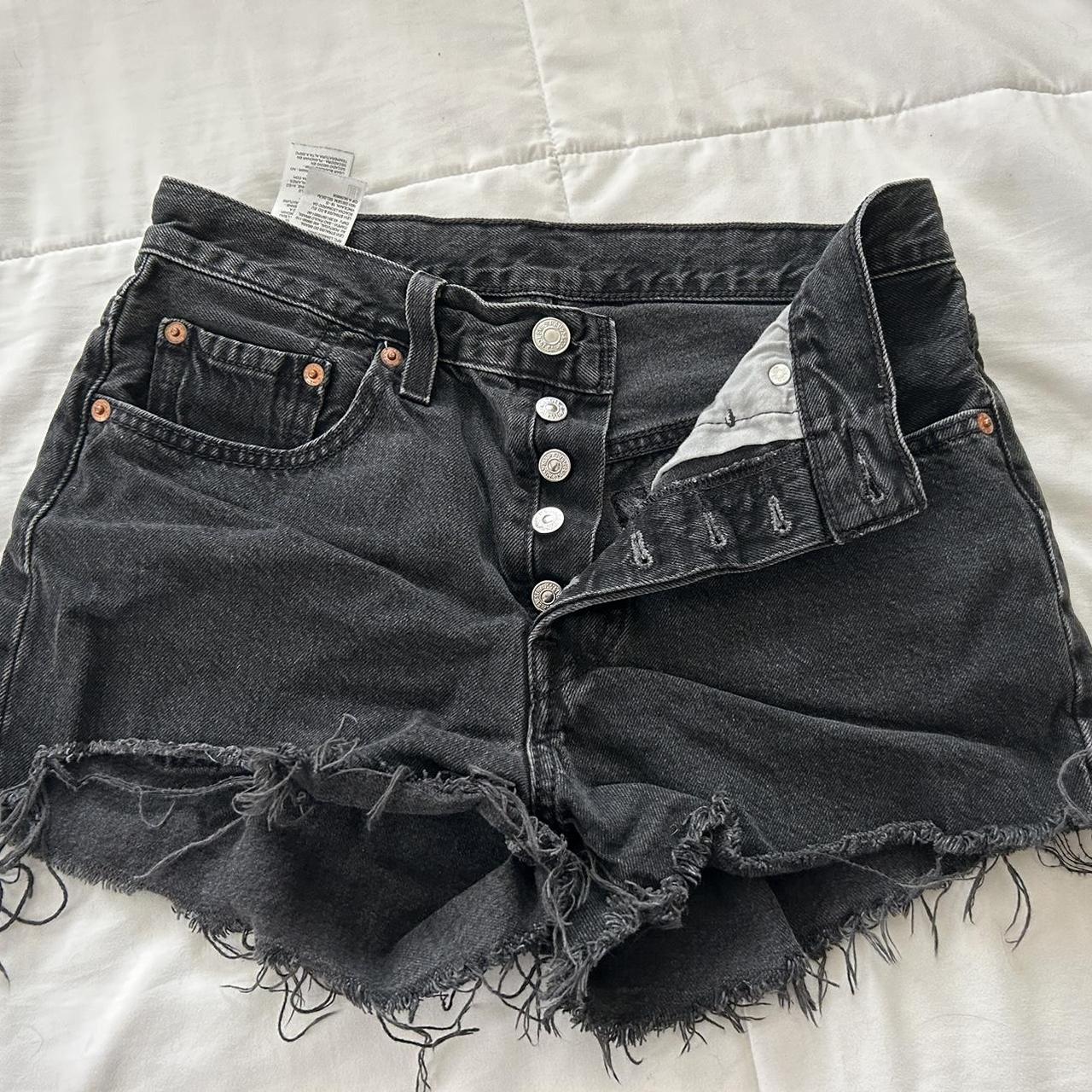 Black Levi shorts with butterfly buttons - Depop