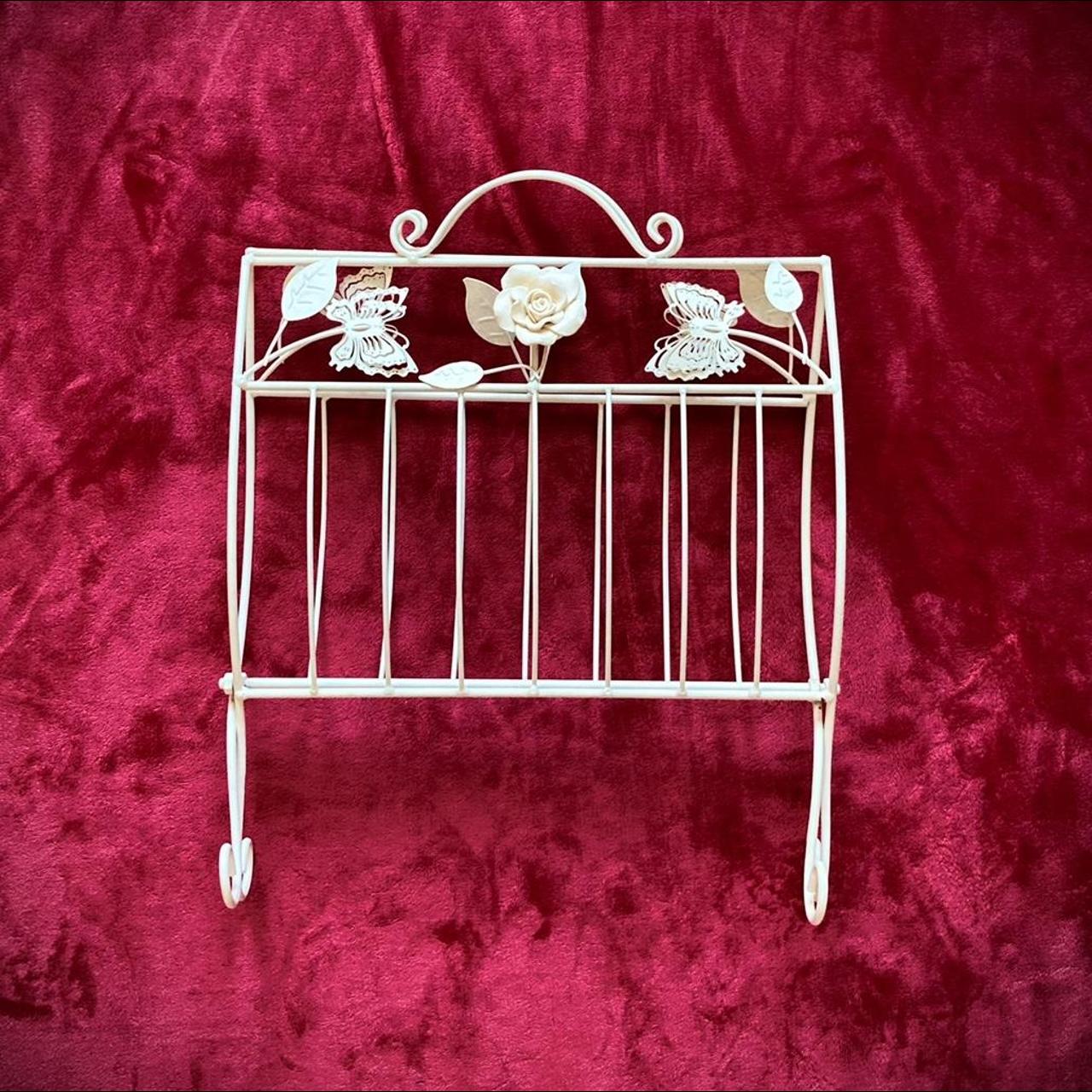 White metal magazine rack, with rose and butterfly... - Depop
