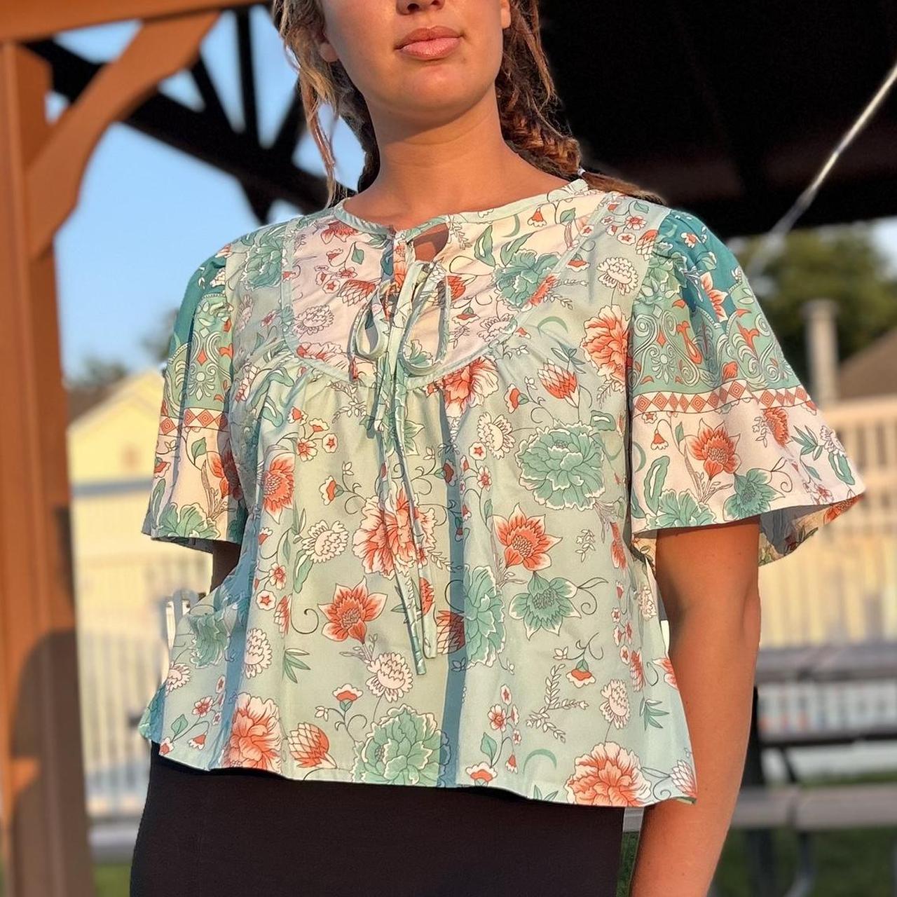 Stunning size L floral wide-sleeve blouse with front... - Depop