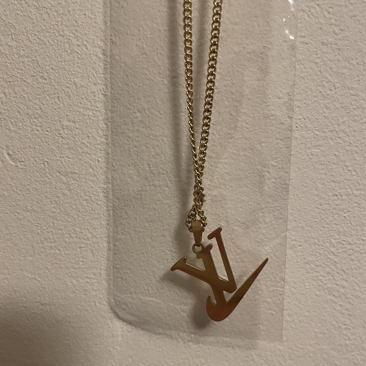 Gold Louis Vitton x Nike chain necklace Stainless... - Depop