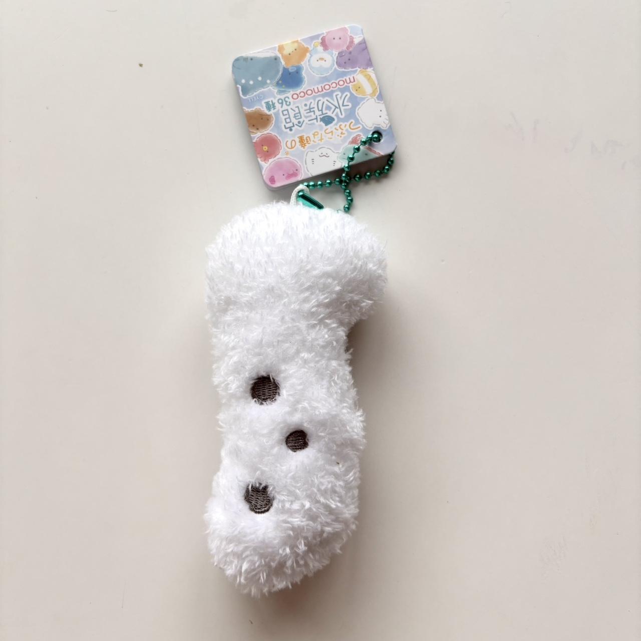 White fuzzy sea slug plush keychain 🤍from japanese... | Depop