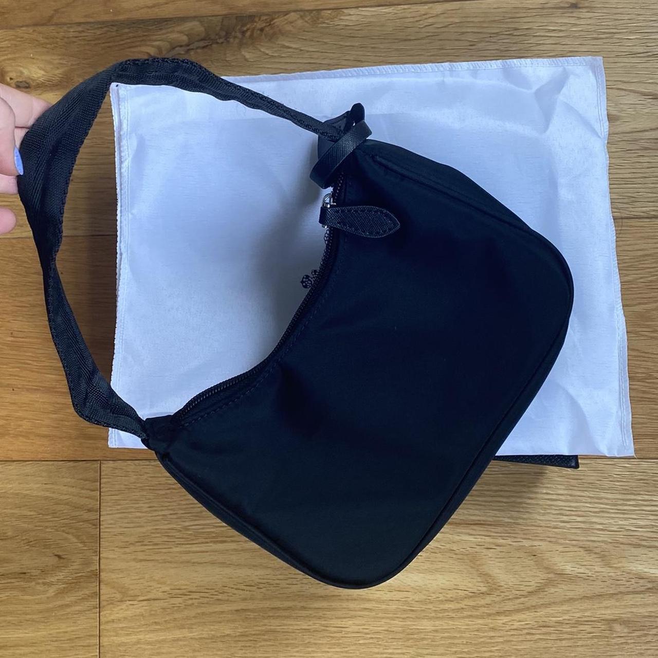 Baby Prada Nylon bag with dust bag. Sold as seen - Depop