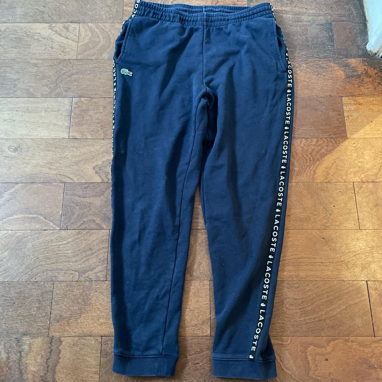 Cool pair of Lacoste tapered joggers in navy with... - Depop