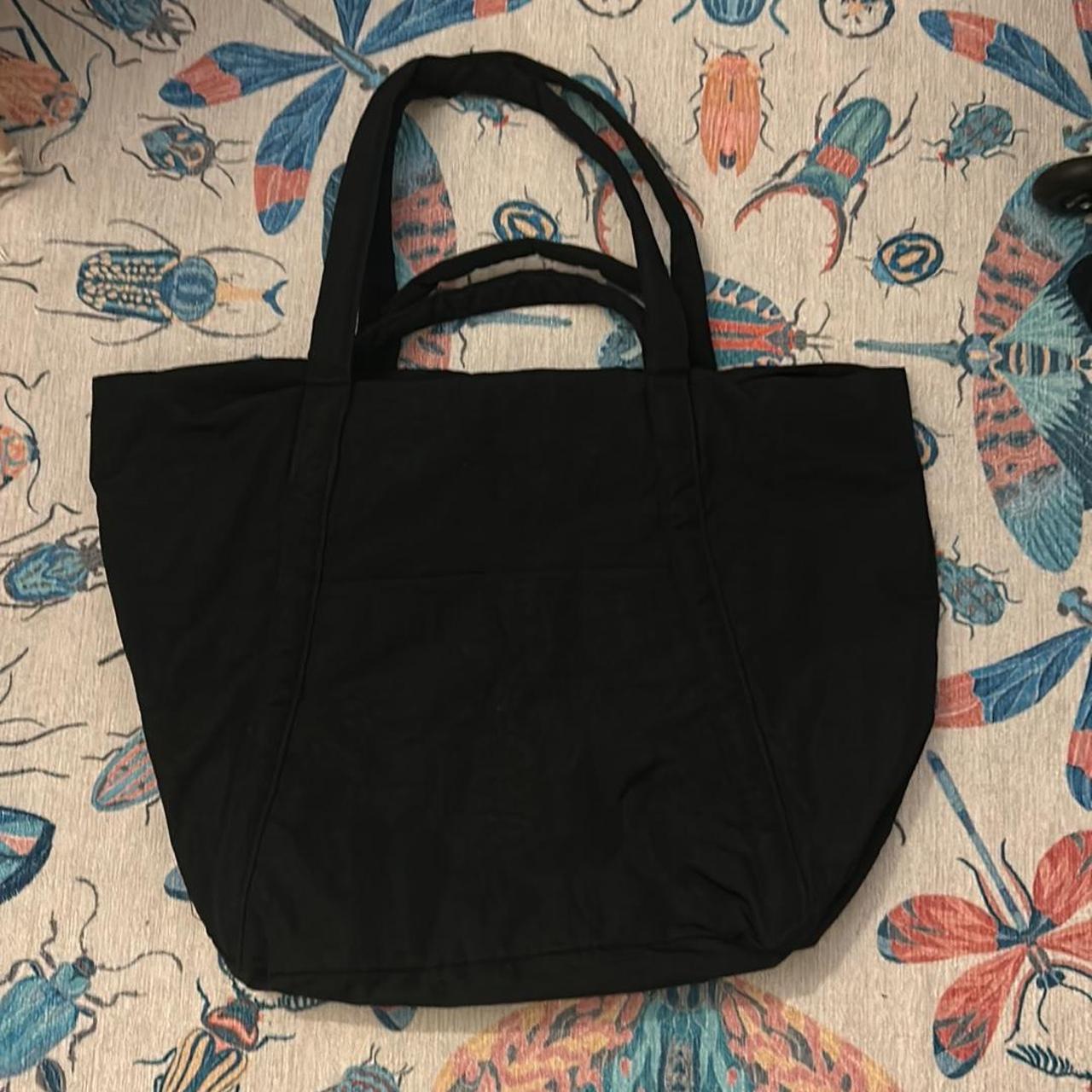 Black baggu cloud travel bag. Purchased on depop,... - Depop