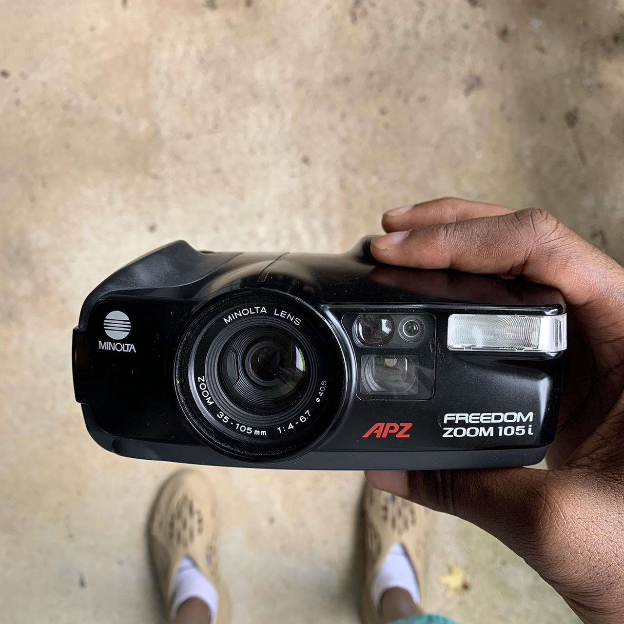 This is the Minolta Freedom Zoom 105i, this is one... - Depop