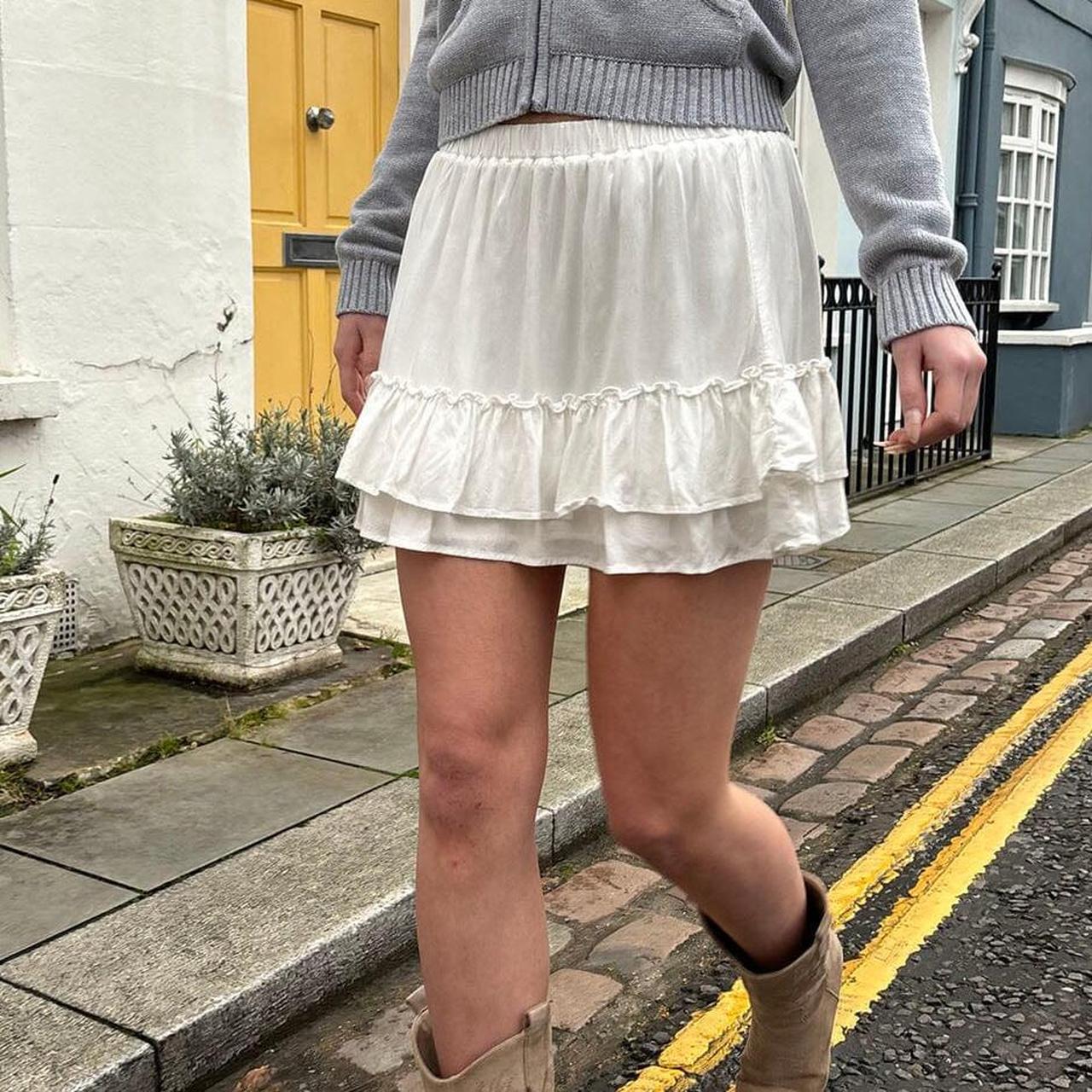 Barely worn brandy Melville mini flowy white skirt... - Depop