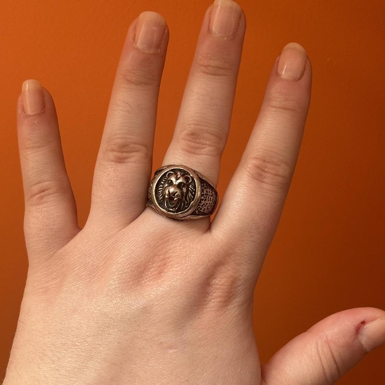 Chunky lion costume jewellery ring. Painted silver... - Depop