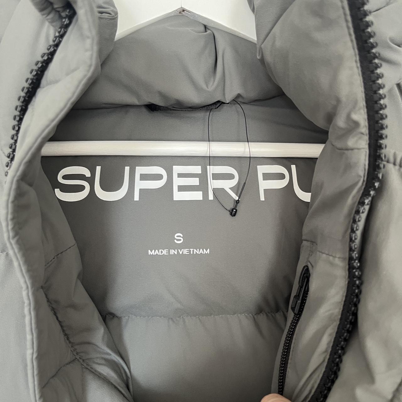 Super puff grey cropped puffer jacket size small... - Depop