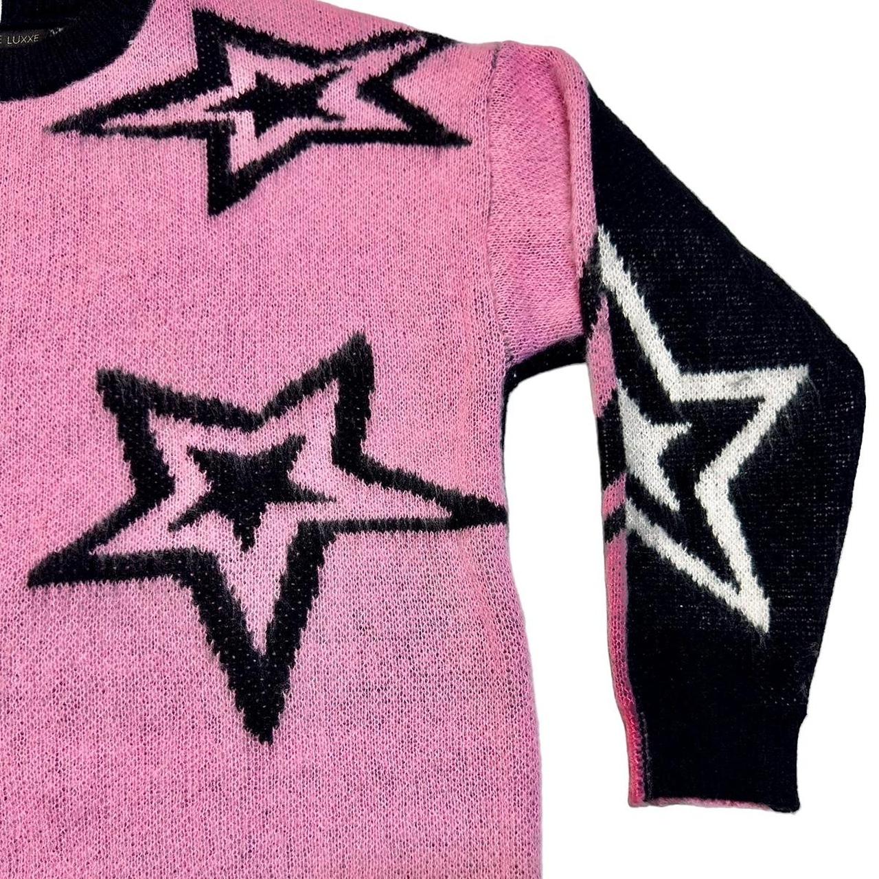 Pink & black colorblock star print sweater one... - Depop