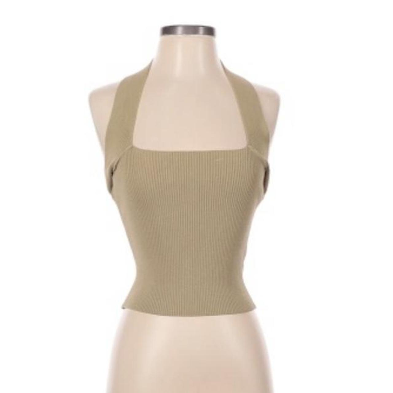 Cute halter top, the neck fabric is long and looks... - Depop