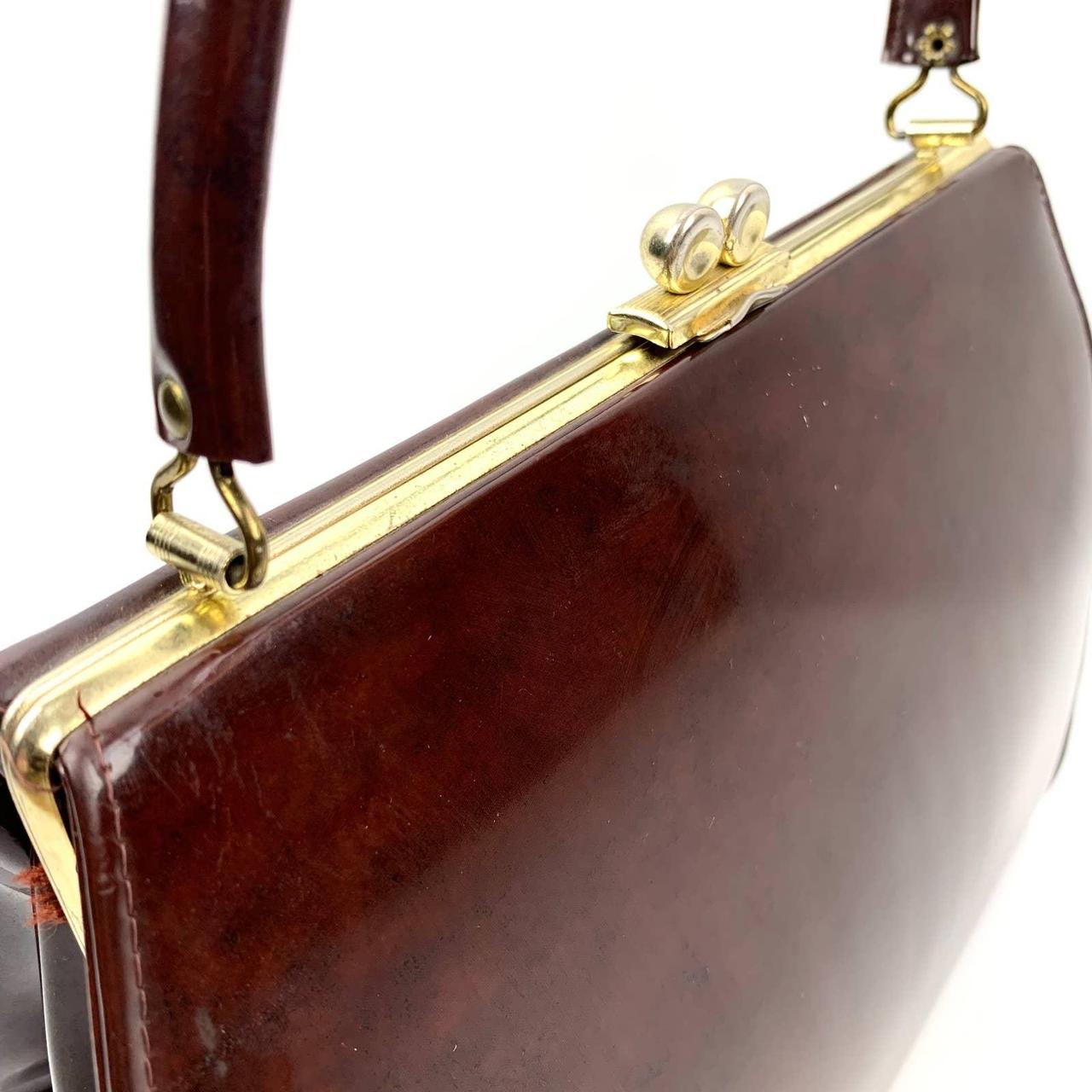 Vintage 1950's brown vinyl kiss-lock purse. Vegan... - Depop