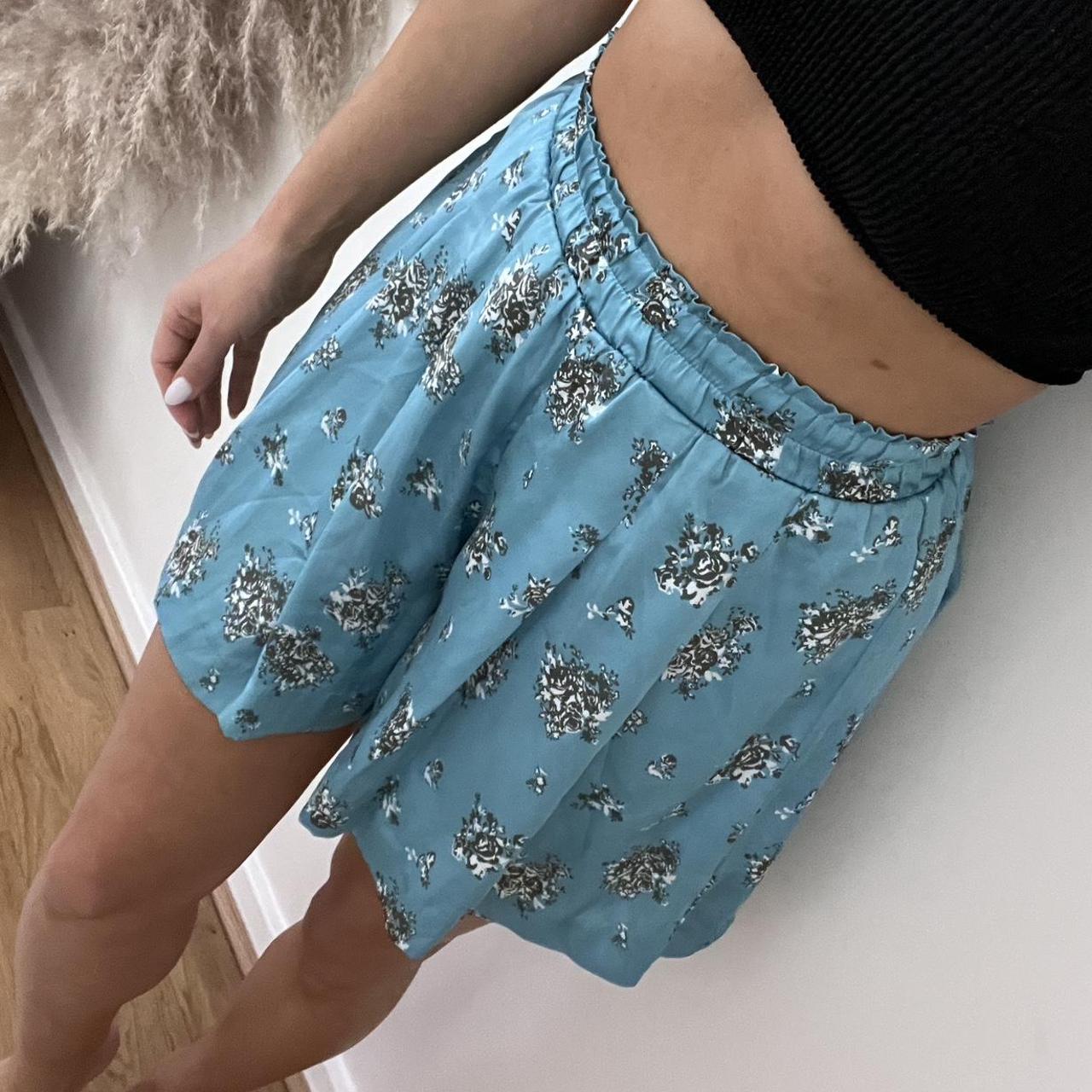 Blue silky cullotte shorts in floral print. By... - Depop