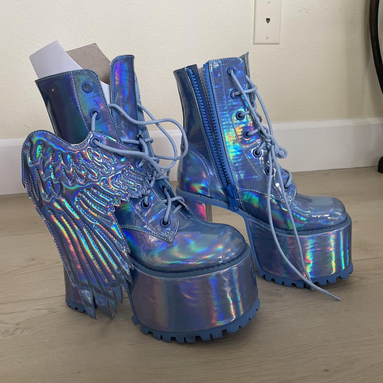 Blue platform boots with iridescent wings by Current... - Depop