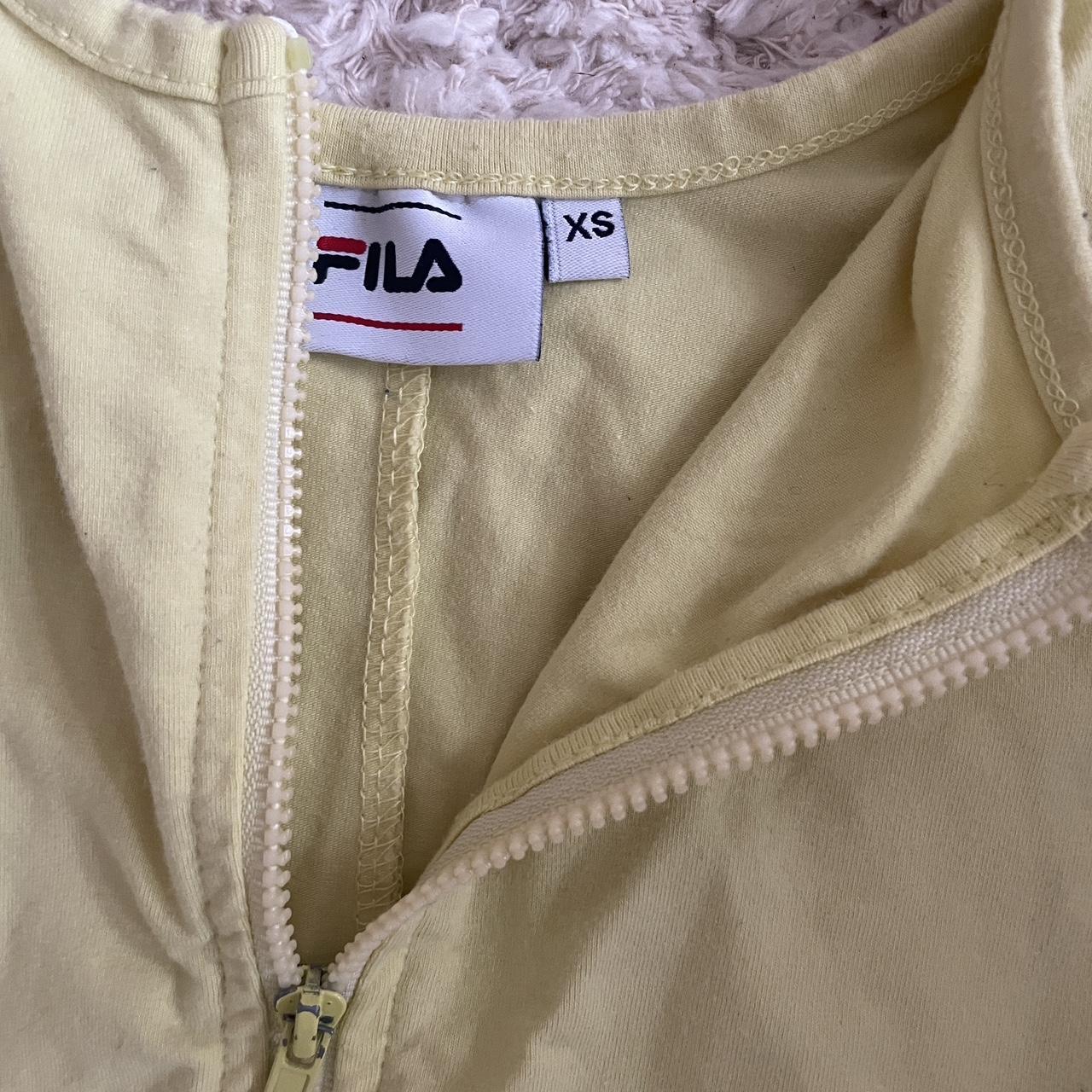 Fila yellow zip up top - Depop